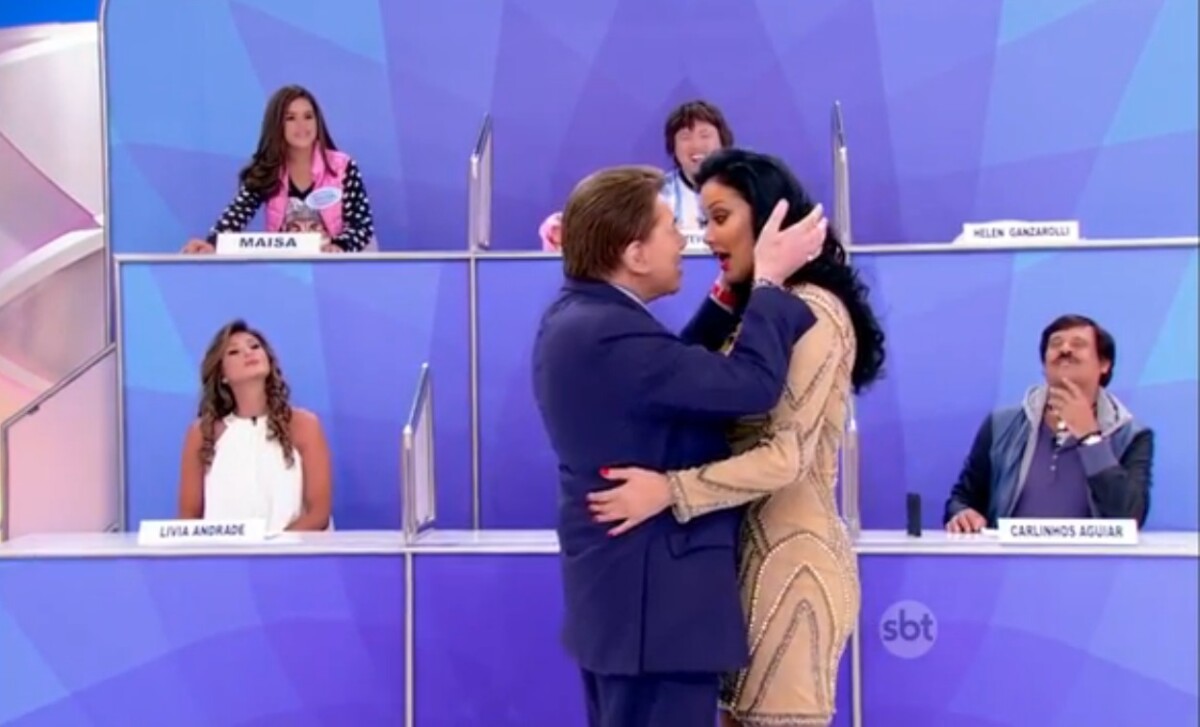 Foto: Silvio Santos segurou a cabeça de Helen Ganzarolli com as duas ...