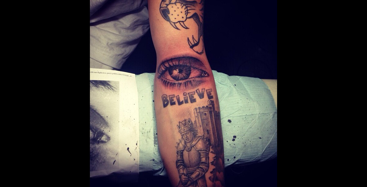 Justin bieber eye tattoo photos - Wisconsintattoocompany.com
