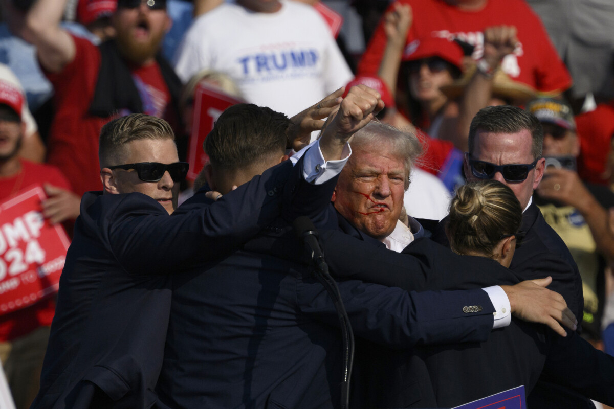 Foto: Donald Trump levou tiro de raspão. Testemunhas viram atirador no ...