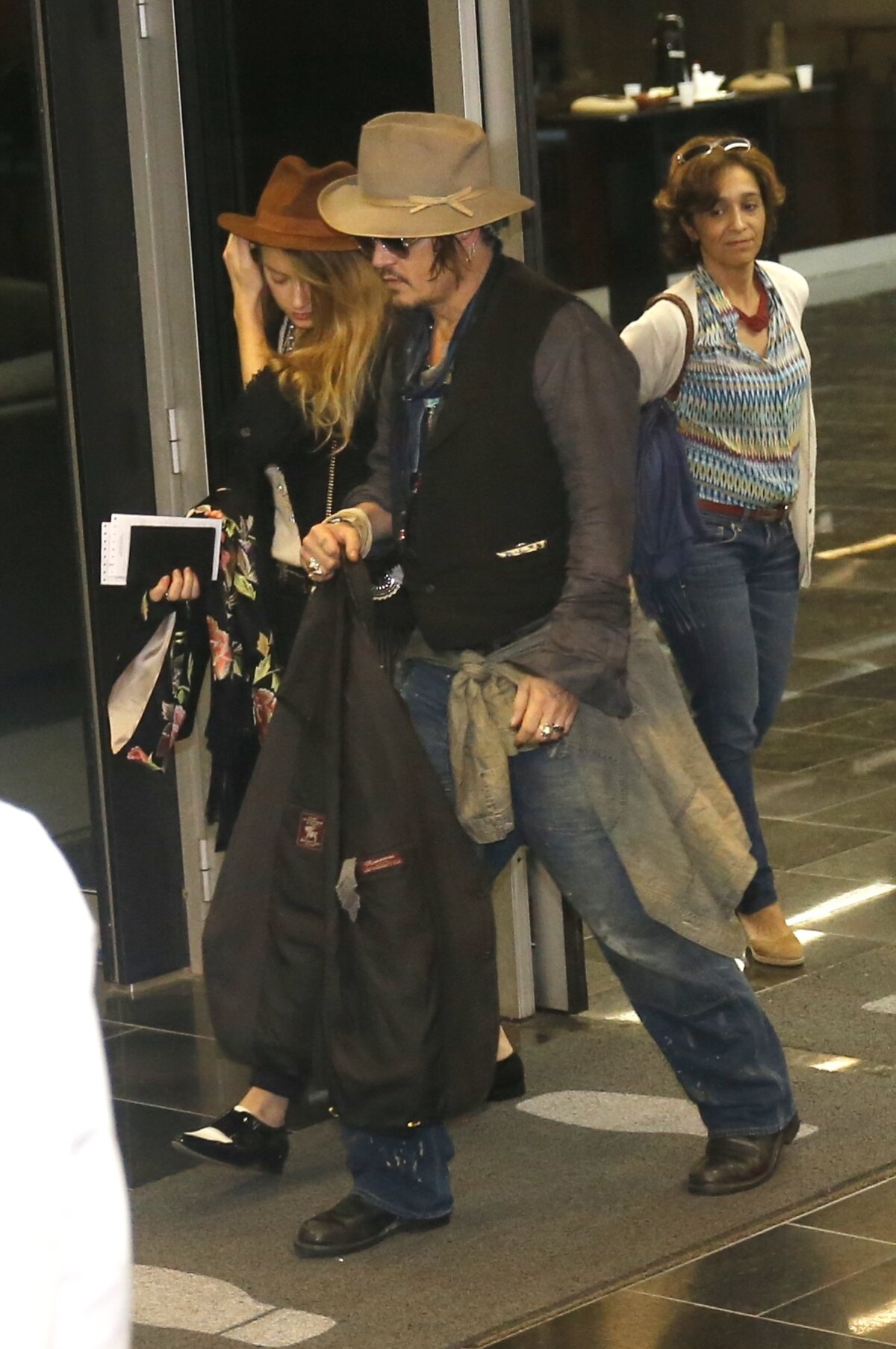 Foto: Johnny Deep e Amber Heard estiveram no Brasil no ano passado ...